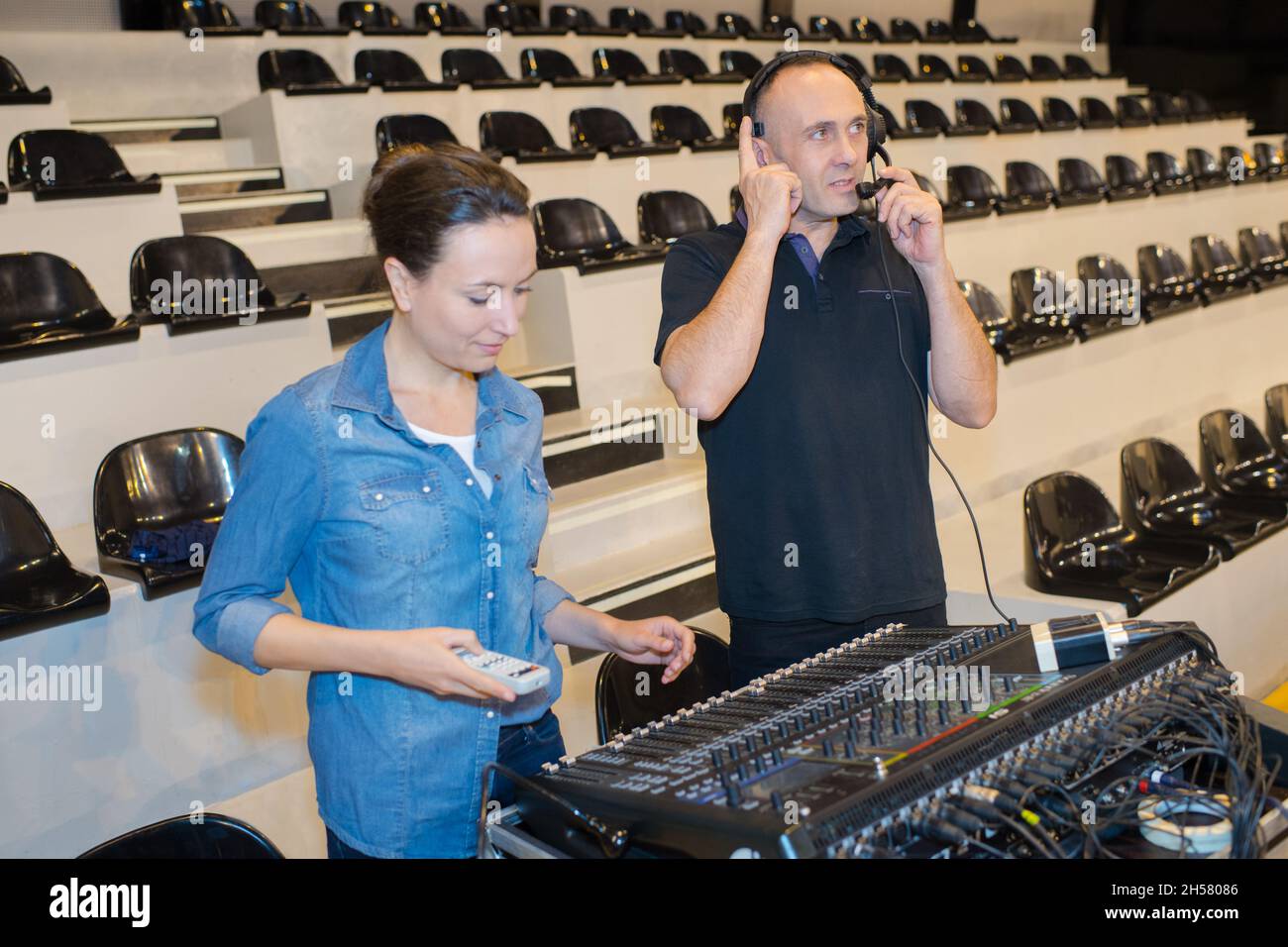 Engineers working digital equipment close hi-res stock photography and ...