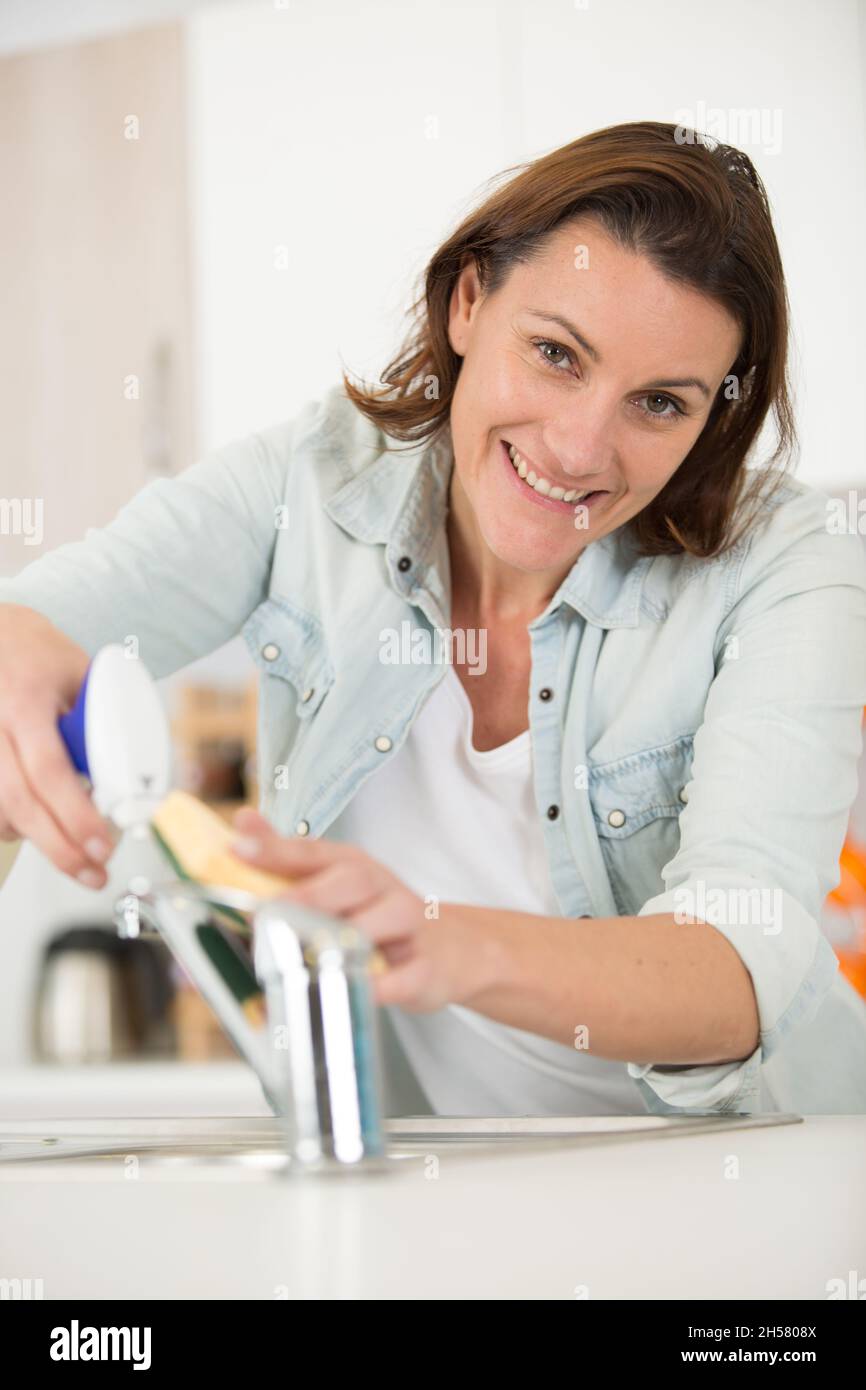 Chinese woman cleaning house hi-res stock photography and images - Alamy