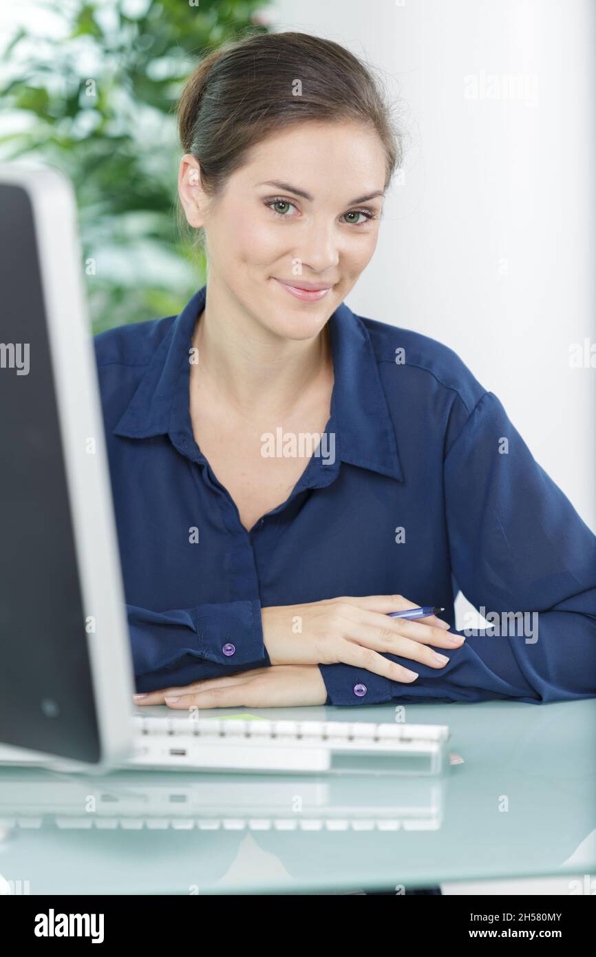 happy office worker looking at camera Stock Photo - Alamy