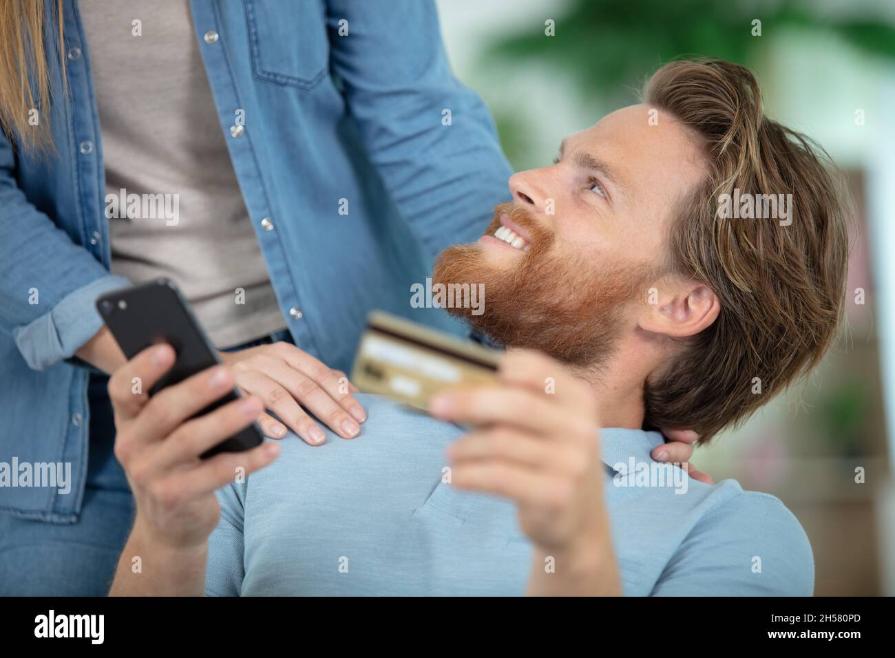 happy husband and wife do paperwork together Stock Photo - Alamy