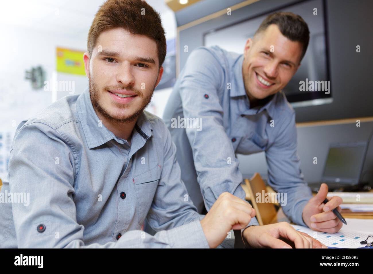 Two male workers in hi-res stock photography and images - Alamy