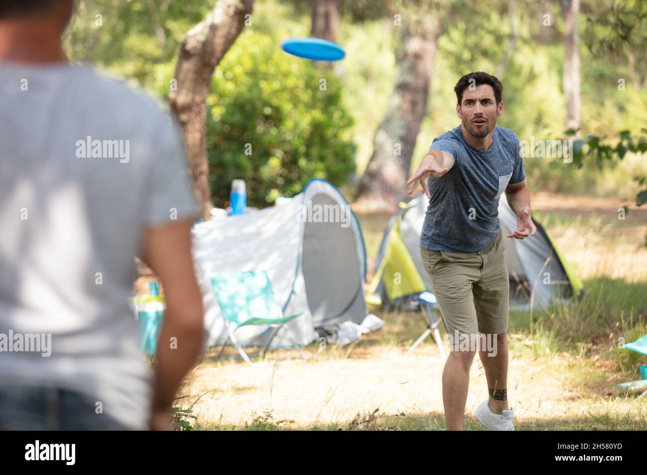 Two young men play frisbee hi-res stock photography and images - Alamy