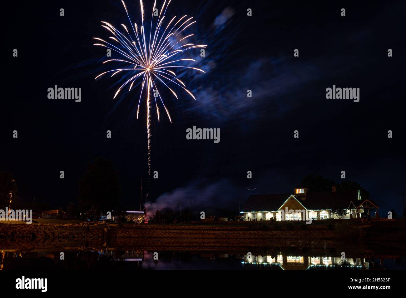 A festive firework explosion in the night sky Stock Photo - Alamy