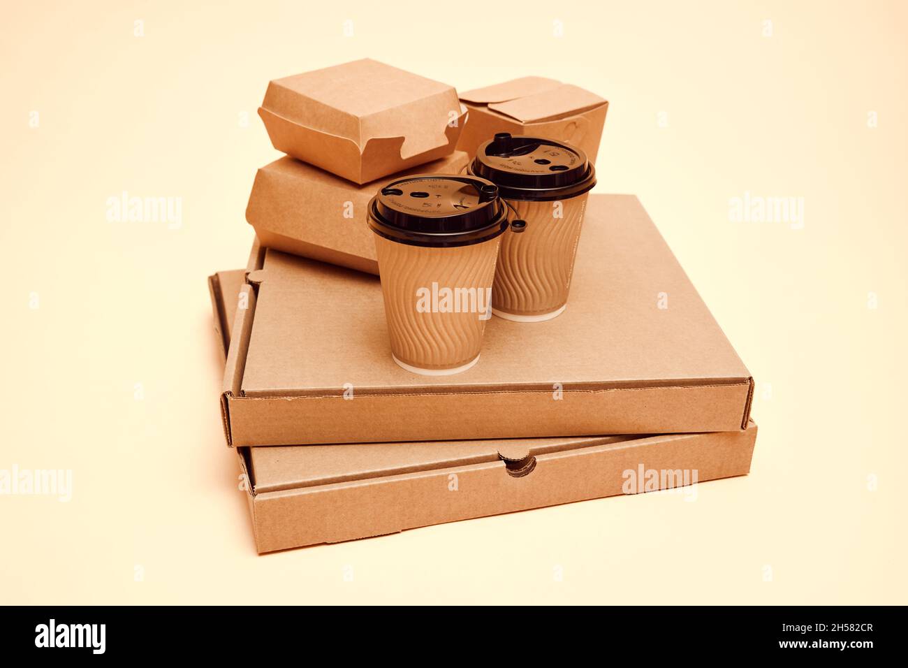 Cardboard food containers for takeaway of delivery service. Pizza, pie ...