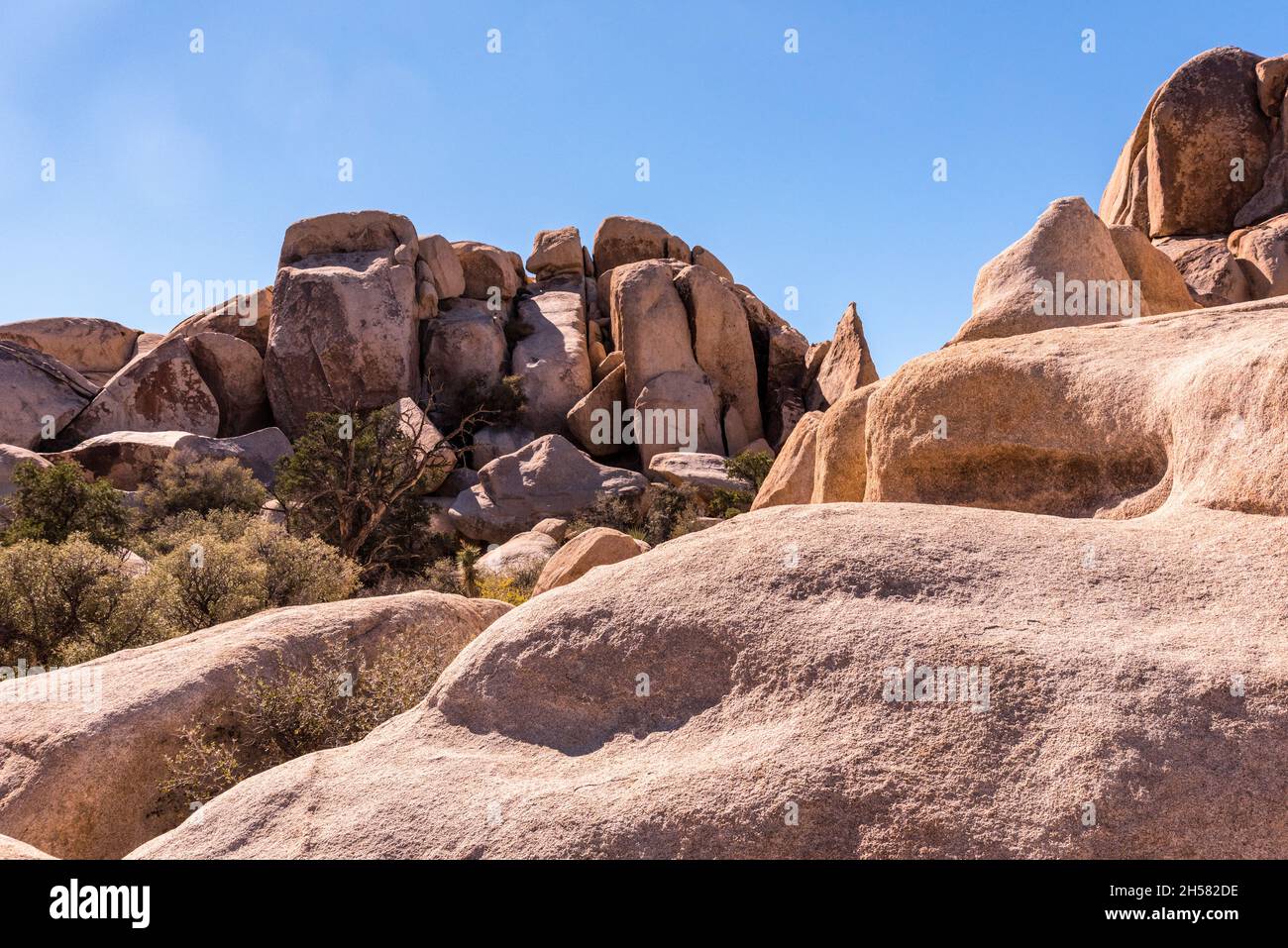 A stack of sandstone boulders in the Joshua Tree National Park, USA ...