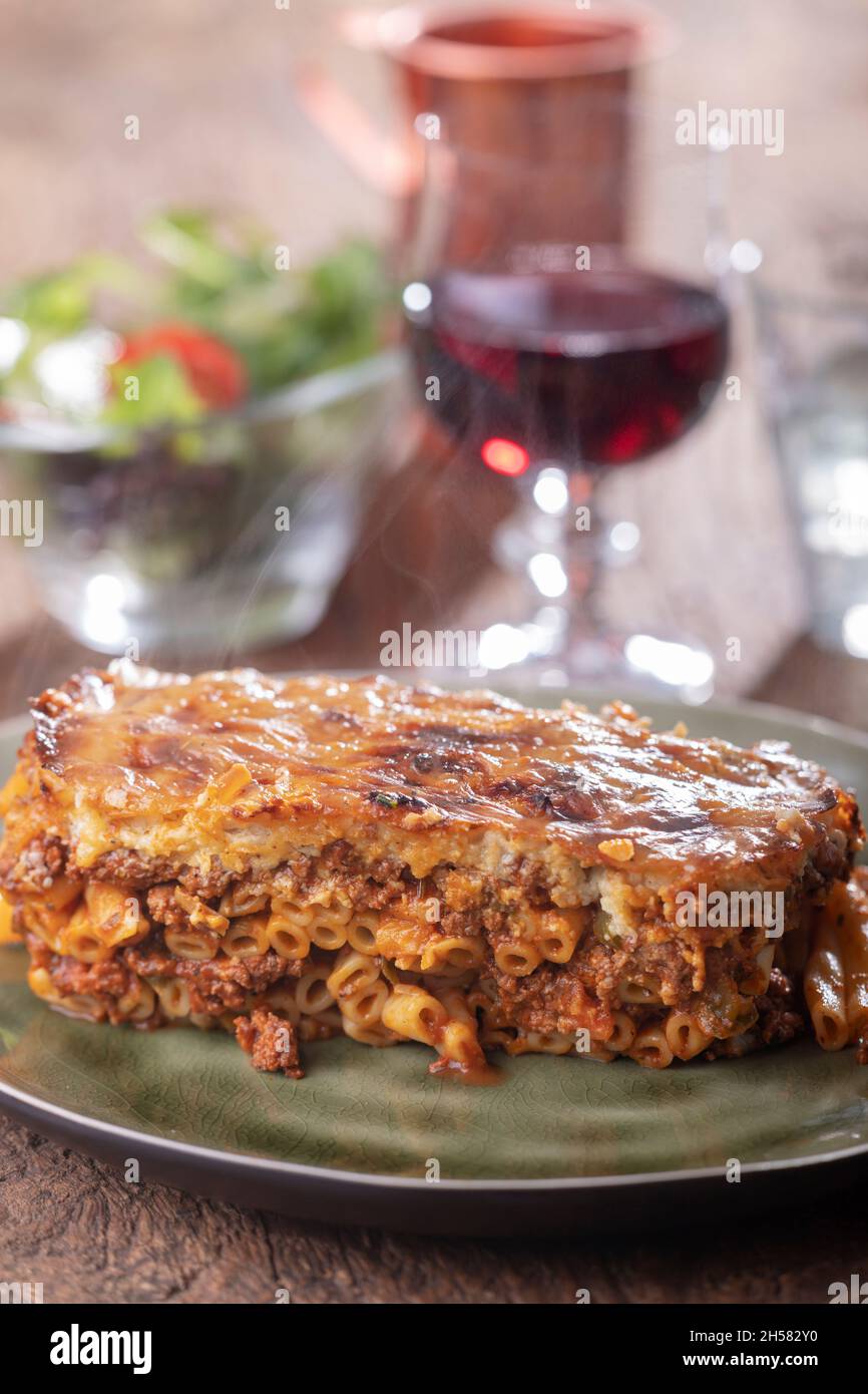 greek pastizio noodle dish with cheese Stock Photo - Alamy
