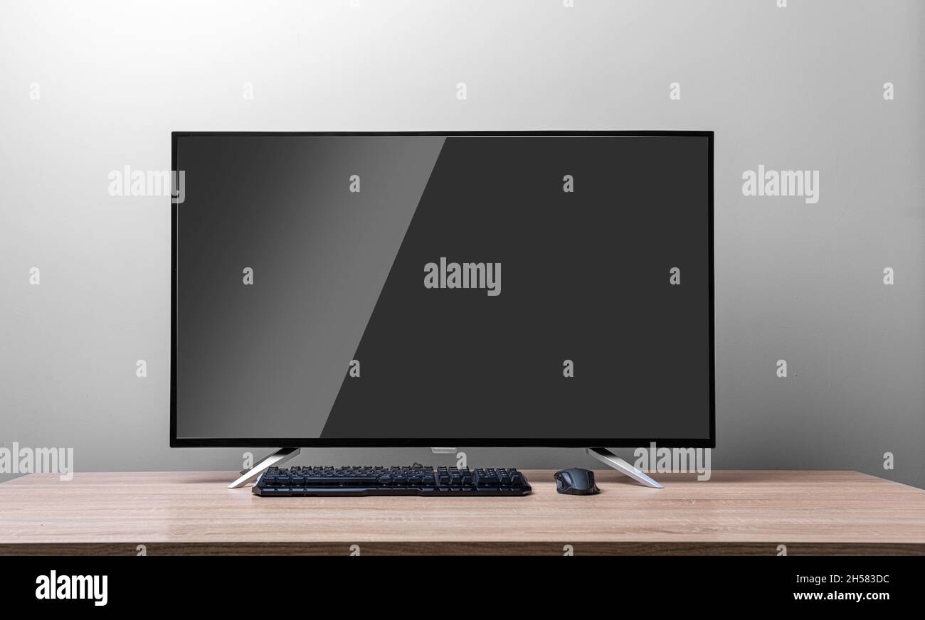 Workplace. Table with a desktop personal computer Stock Photo - Alamy