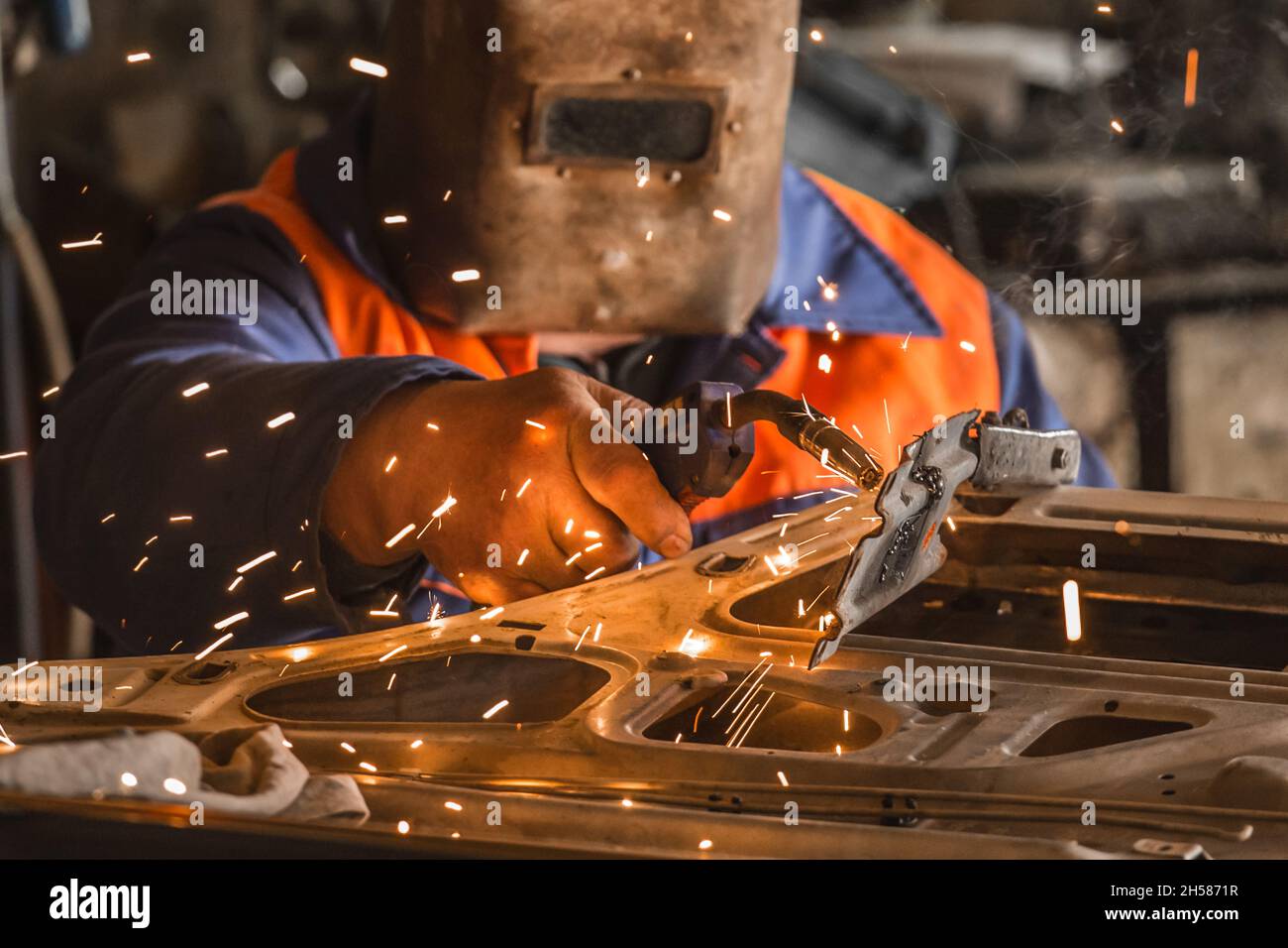 Welder carries out welding metal hi-res stock photography and images ...