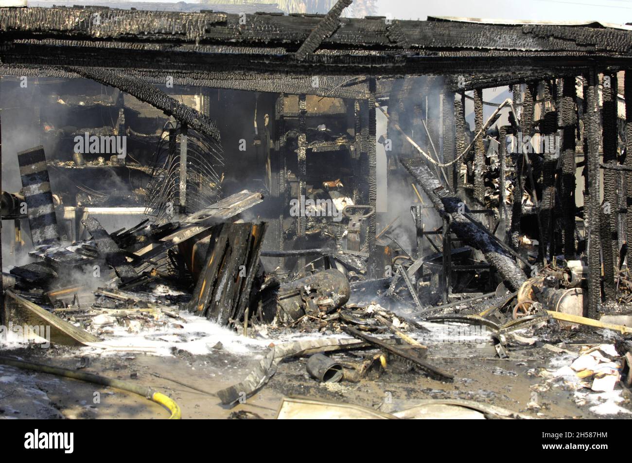 All that remains of a two-car garage, after San Diego Fire-Rescue ...