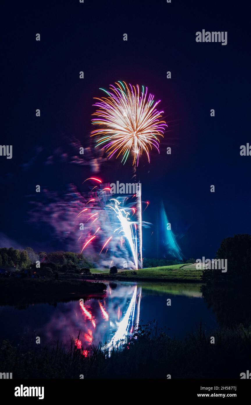 Magnificent firework explosions in the night sky Stock Photo - Alamy