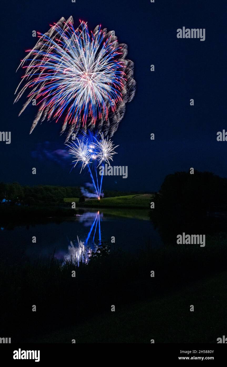 Colorful firework explosion in blue tones Stock Photo - Alamy