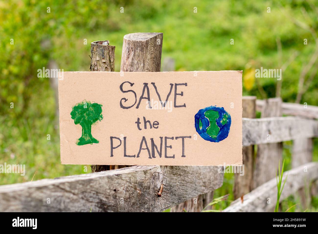 SAVE THE PLANET, poster asking to save our planet isolated on a natural ...