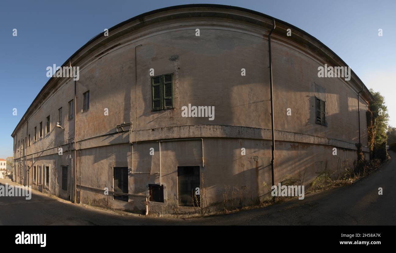 Oblique sunlight on rear wall of Catholic seminary in Arona, Italy ...