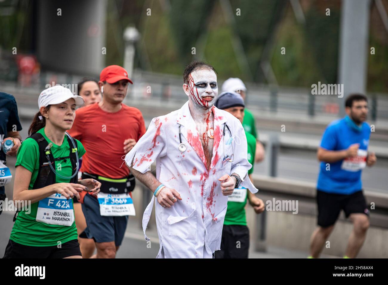 A runner wearing zombie make-up is seen during the 43rd Istanbul ...