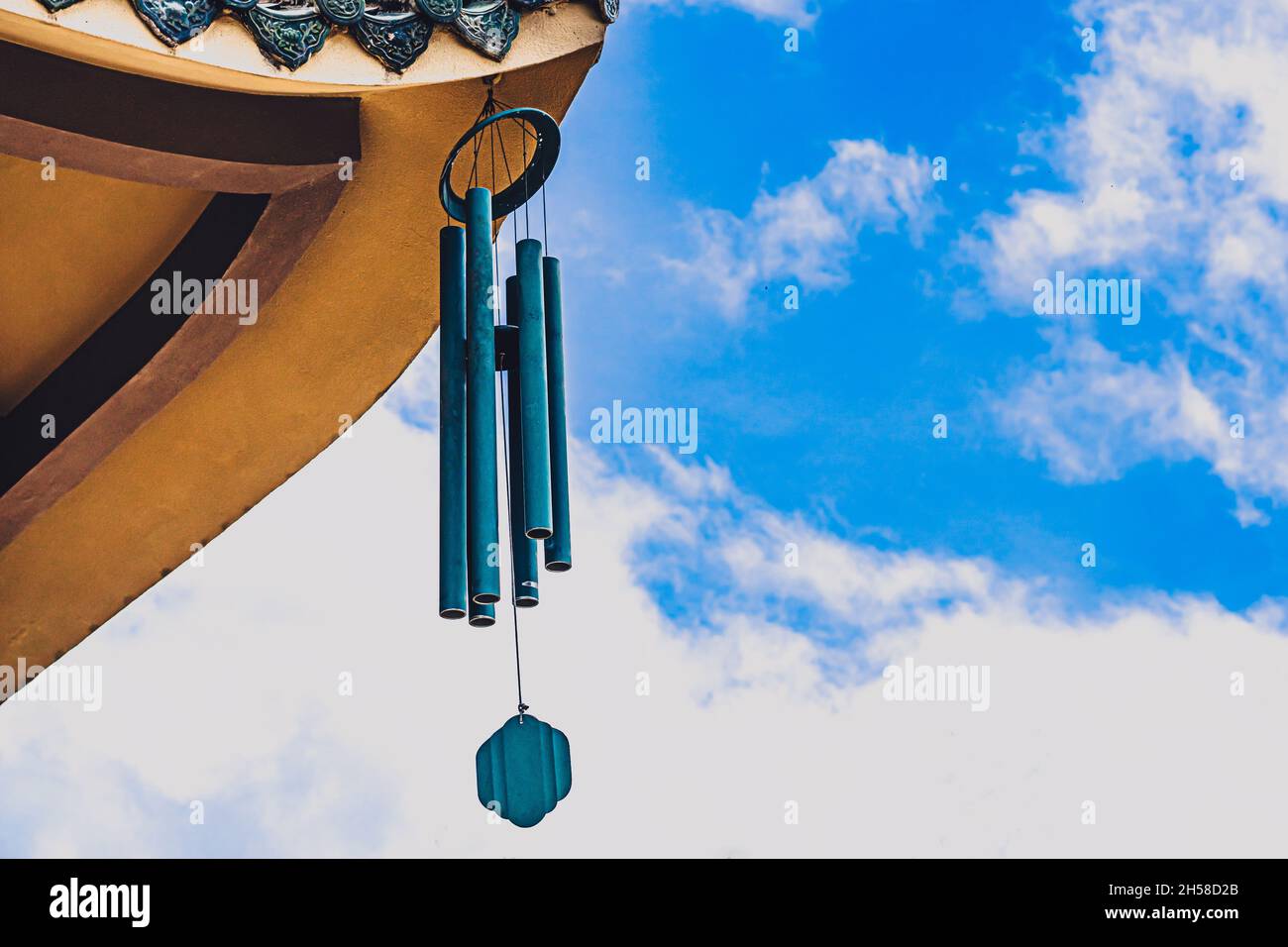 E Pagoda curved roof building temple, metal big hanging wind sound bell ...