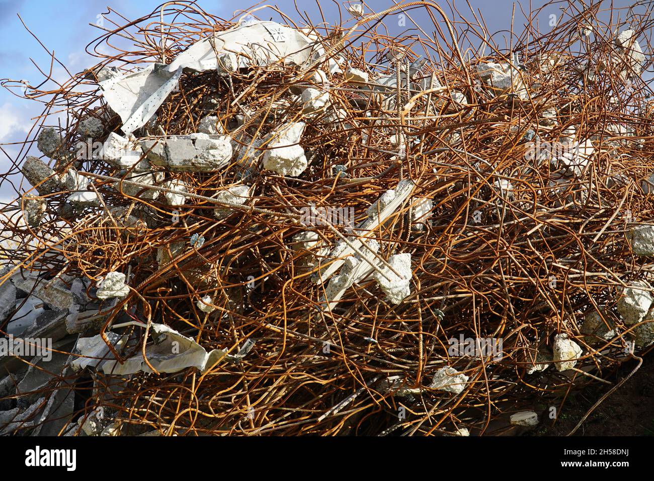 Concrete rubble debris with reinforcement steel bars. The last remains ...