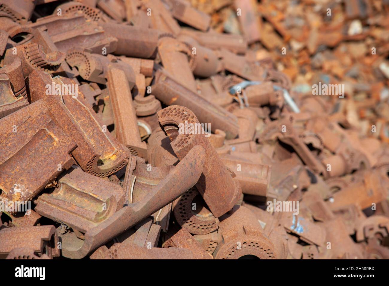 Piles of broken cast scrap steel in a scrap yard Stock Photo - Alamy