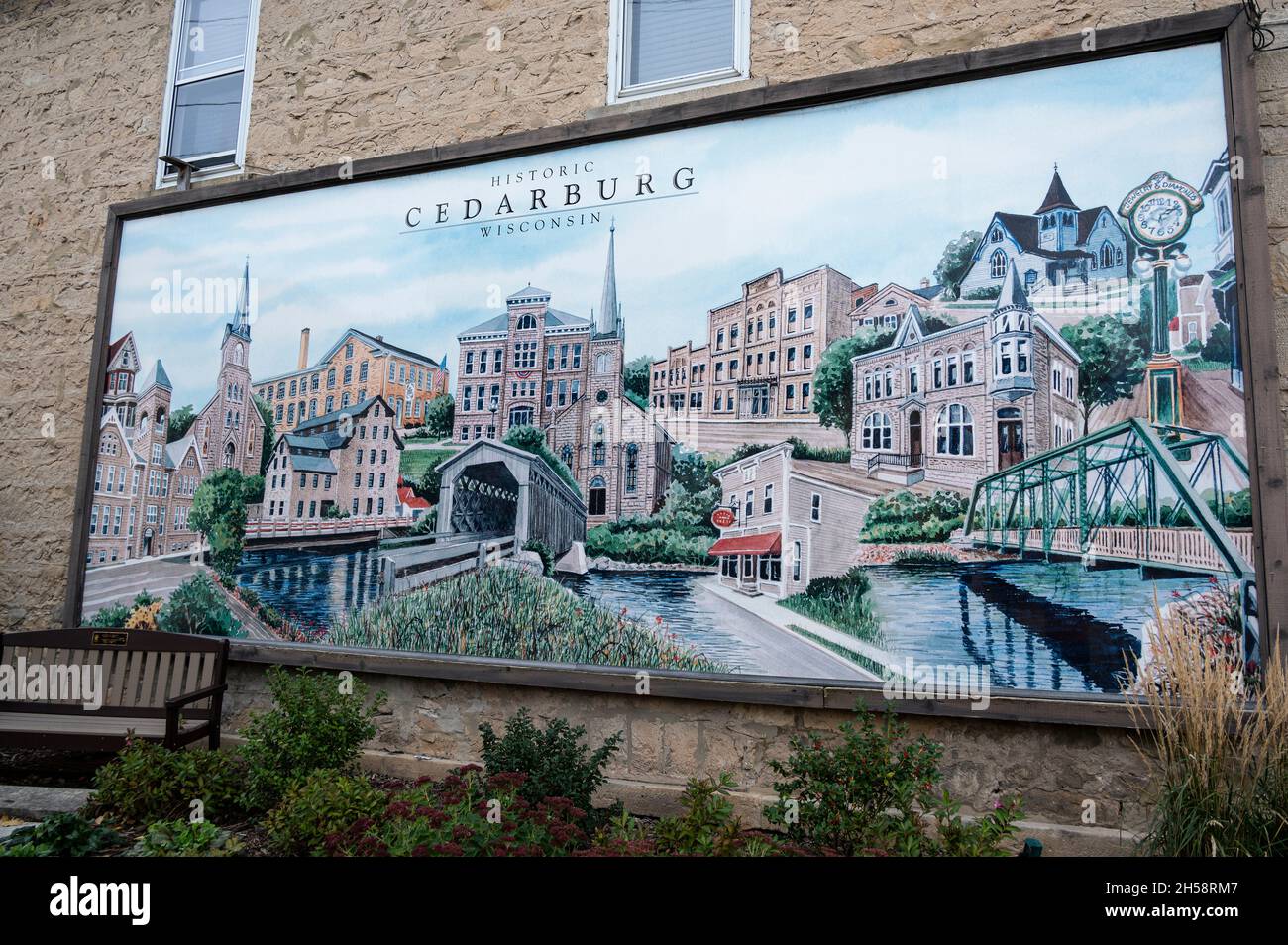 a sign showing the iconic buildings in historic Cedarburg, WI, USA ...