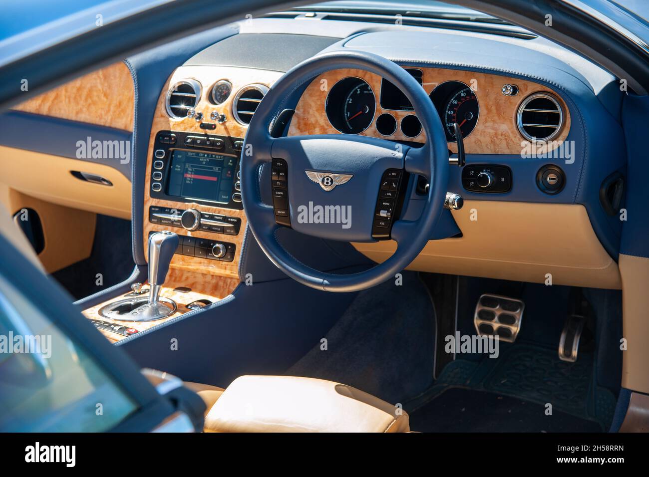 Steering wheel and dashboard of a Bentley GT Coupe viewed through the ...