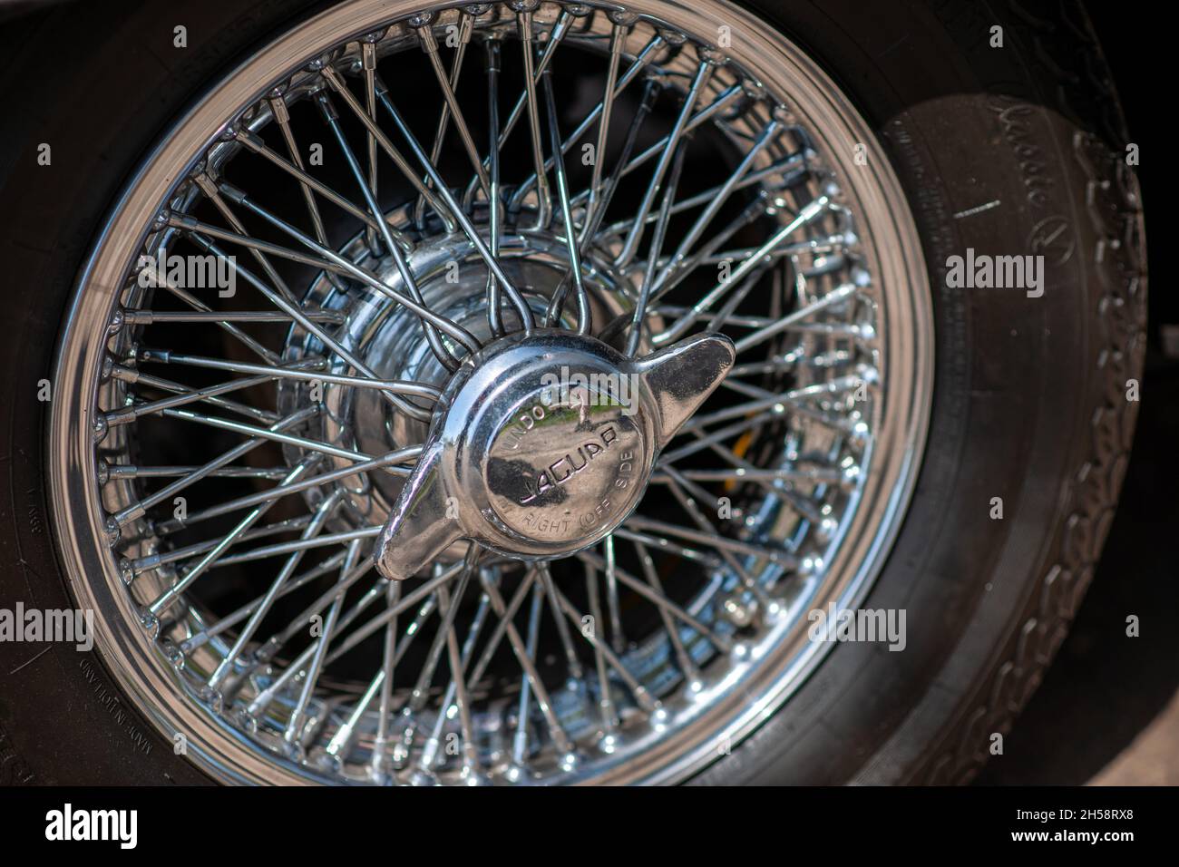 Early model two-door Range Rover parked on a farm field on a Summer ...