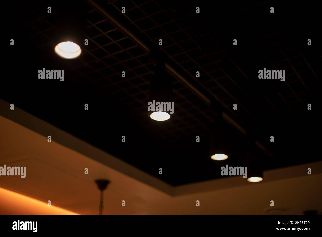 Lamps on the ceiling. Light in the interior. Ceiling in the room ...