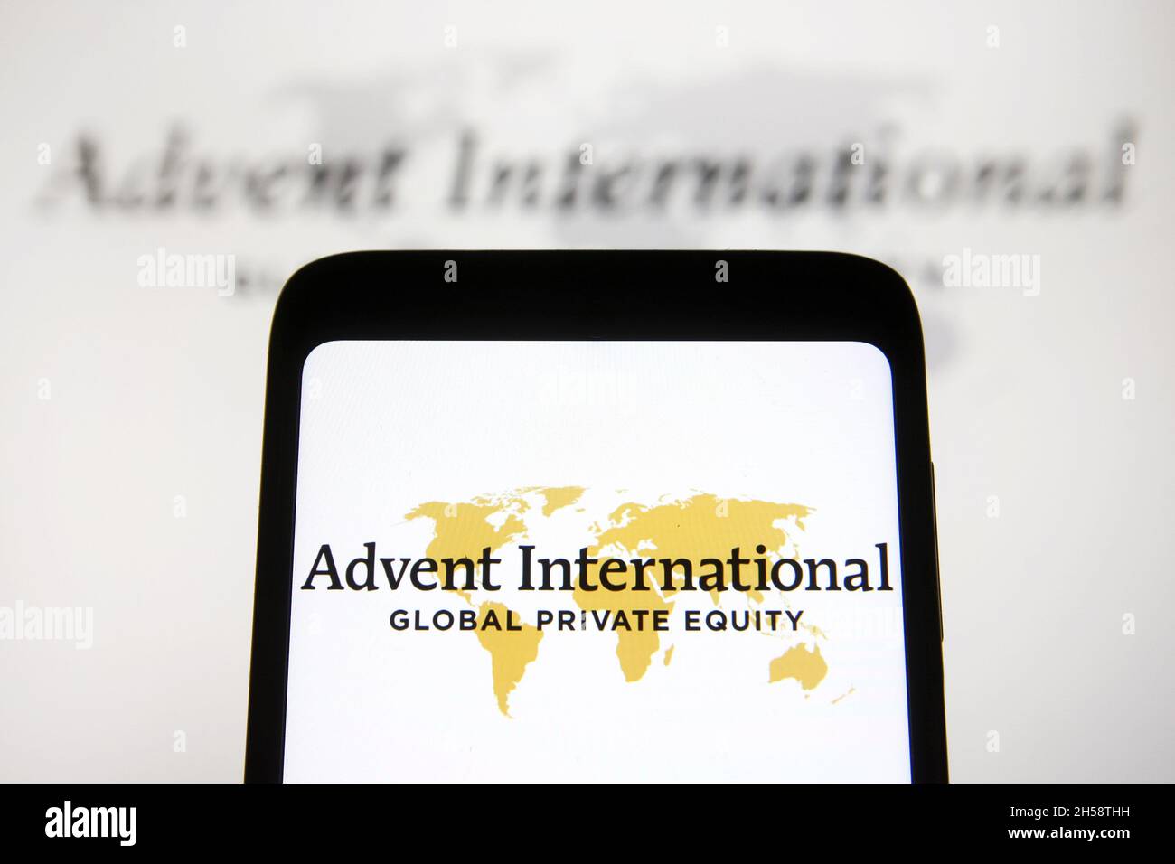 In this photo illustration, an Advent International Corporation logo is ...