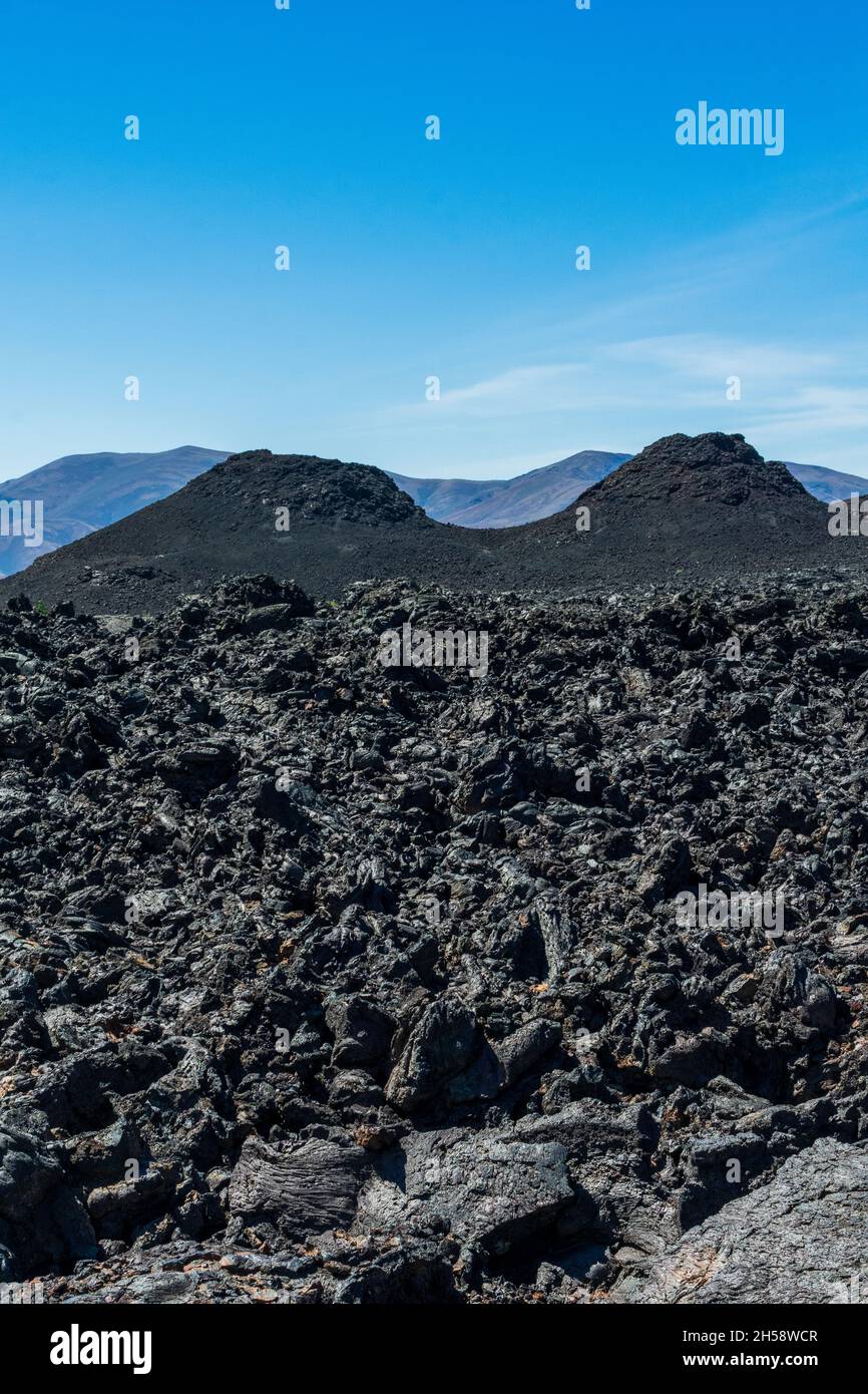 Cinder cones glisten in sunlight in Craters of The Moon National ...