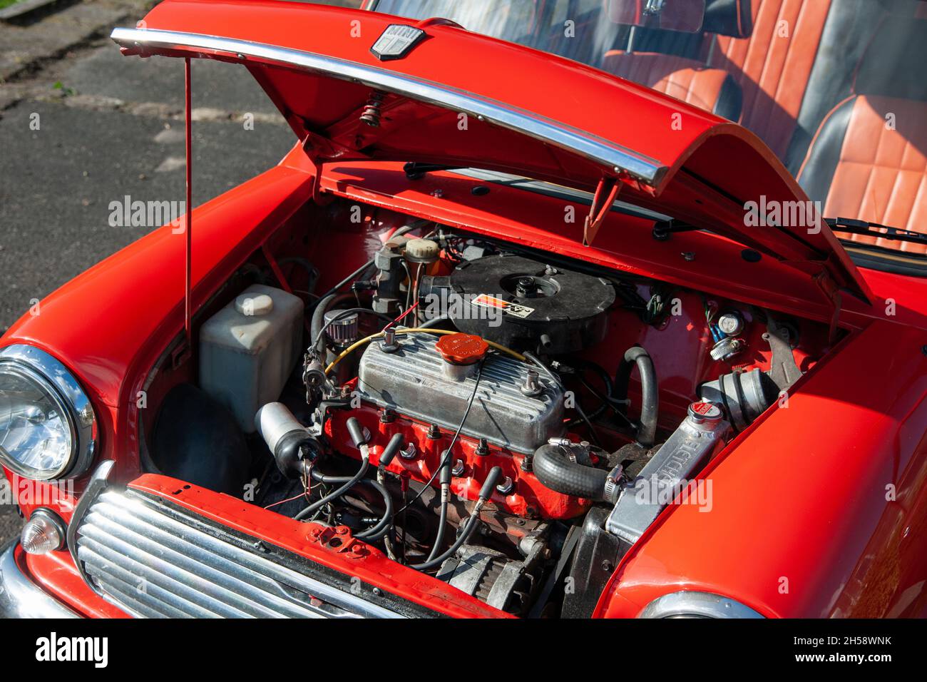 Classic Sixties Austin Mini with its bonnet up showing the engine Stock ...