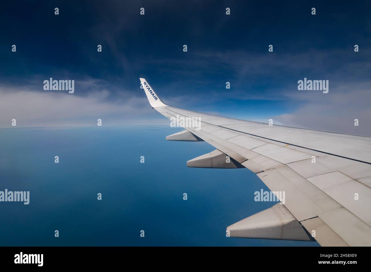 06/09/2021. Commercial Ryanair airborne airplane at high altitude ...
