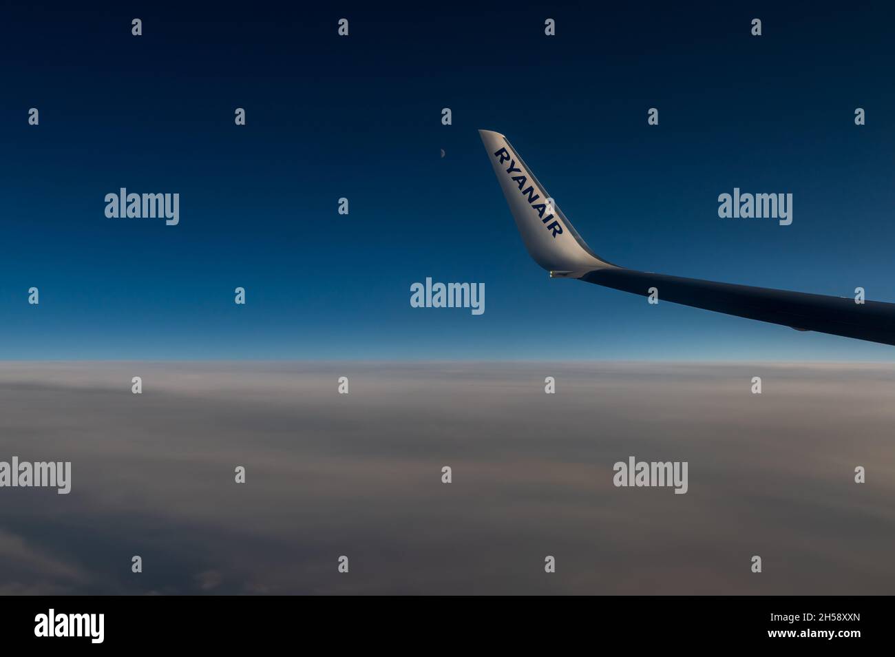 06/09/2021. Commercial Ryanair airborne airplane at high altitude ...