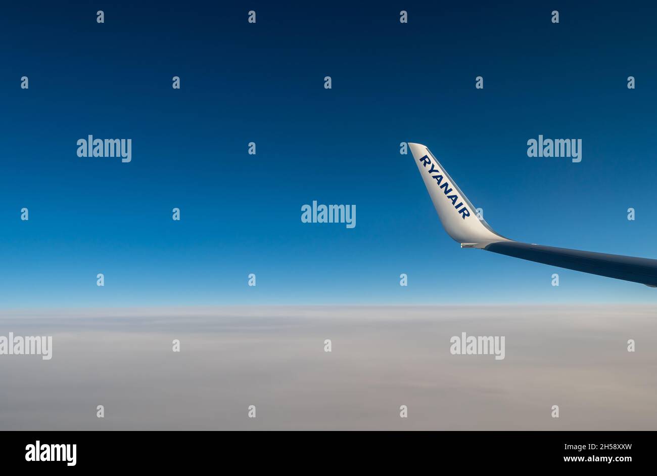 06/09/2021. Commercial Ryanair airborne airplane at high altitude ...