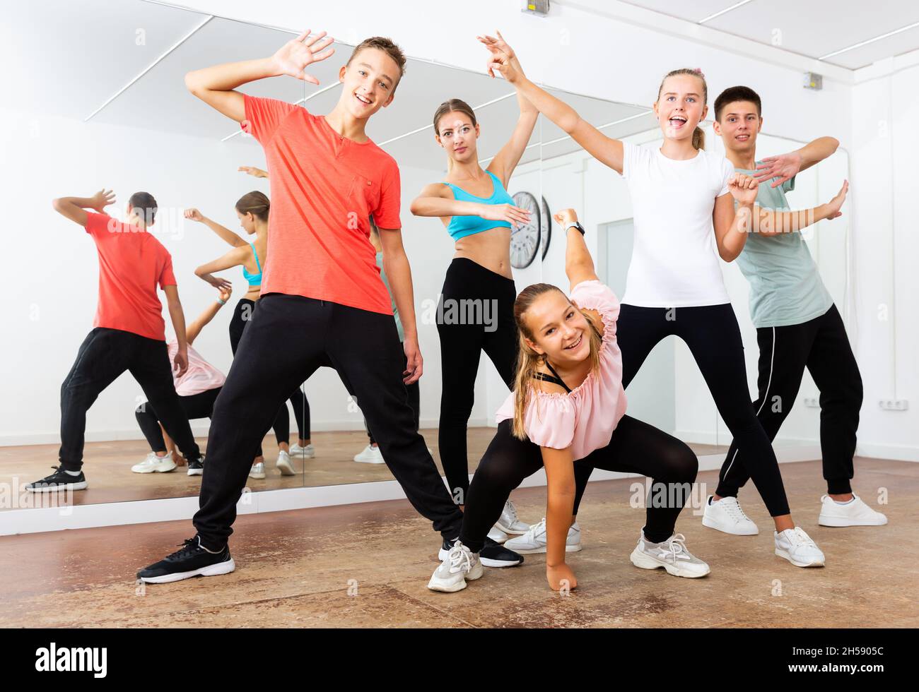 Group portrait of fine teenagers in dance studio Stock Photo - Alamy