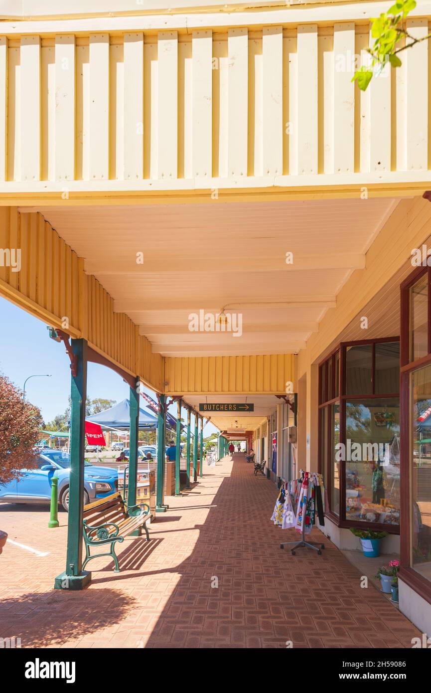 Vertical view of a verandah of shops in the main street of the small ...