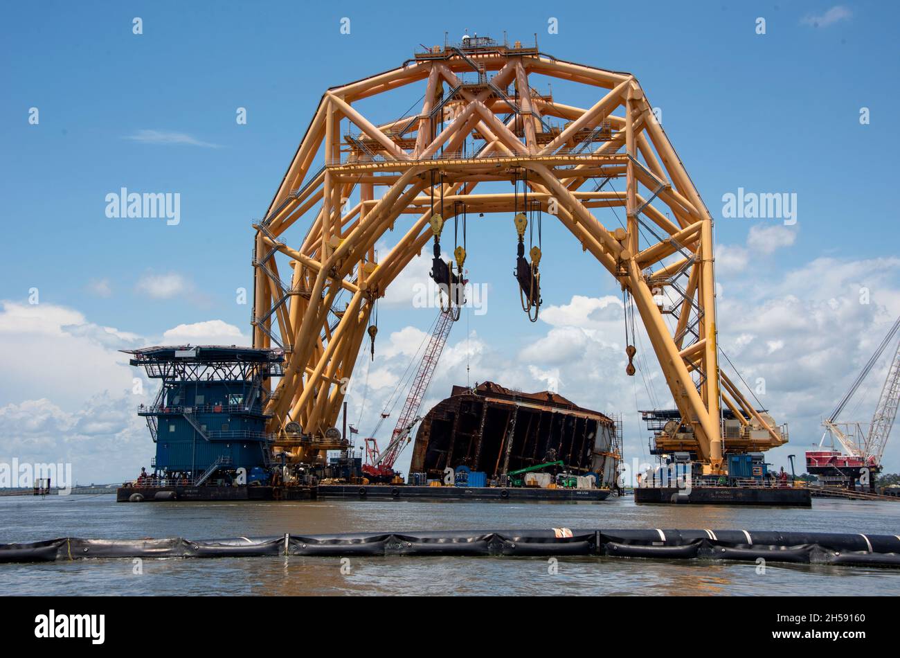 Wreck removal personnel continue refitting the VB-10000 in preparation ...