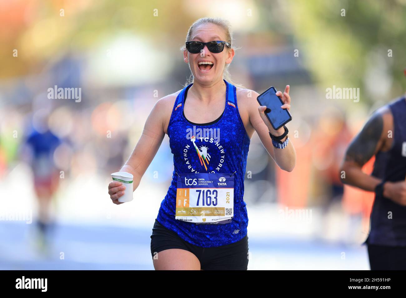 New York, N.Y/USA – 7th Nov. 2021: A runner is all smiles for the ...
