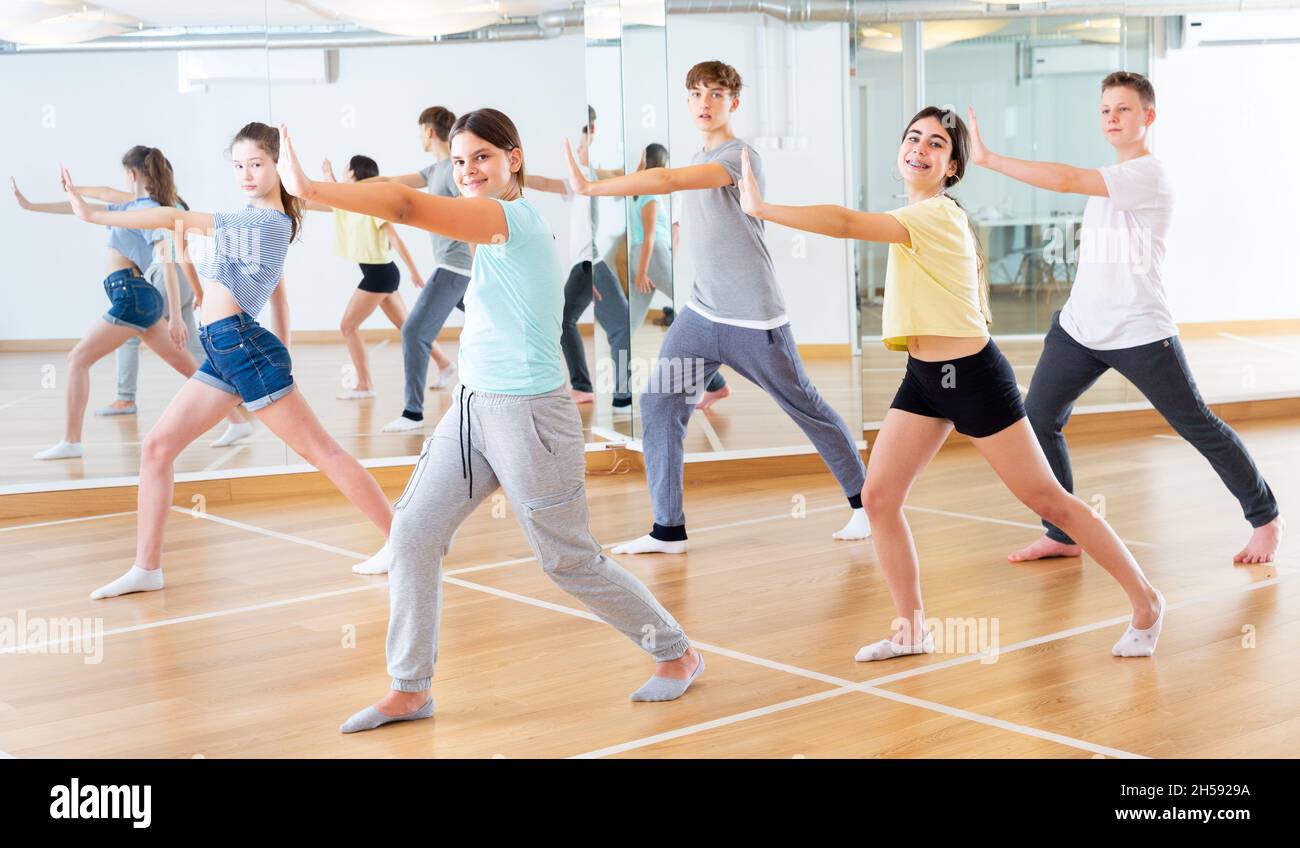 Teenage dancers practicing new dance in studio Stock Photo - Alamy