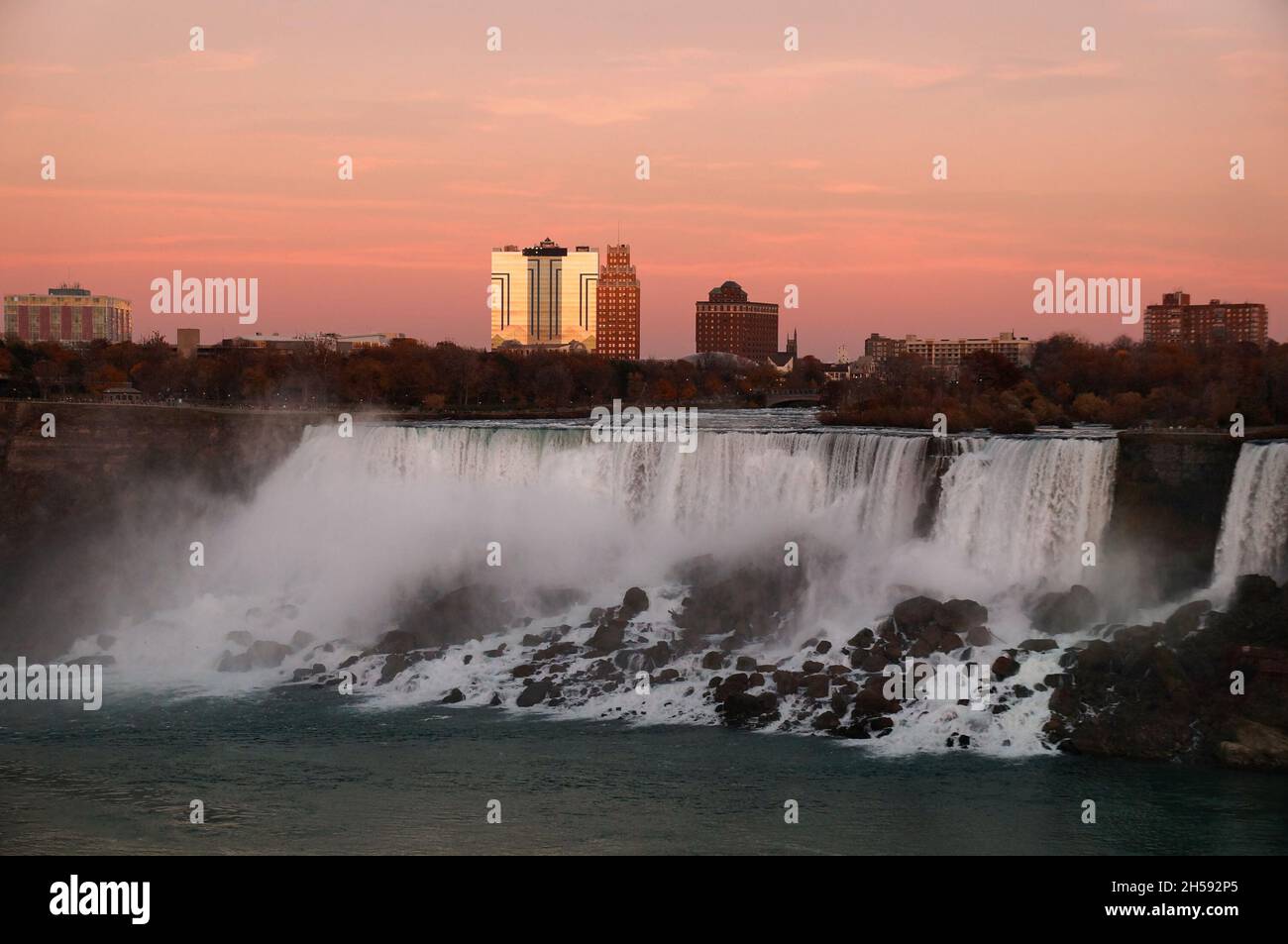 Sunset view of American Niagara Falls waterfall in front of spectacular ...
