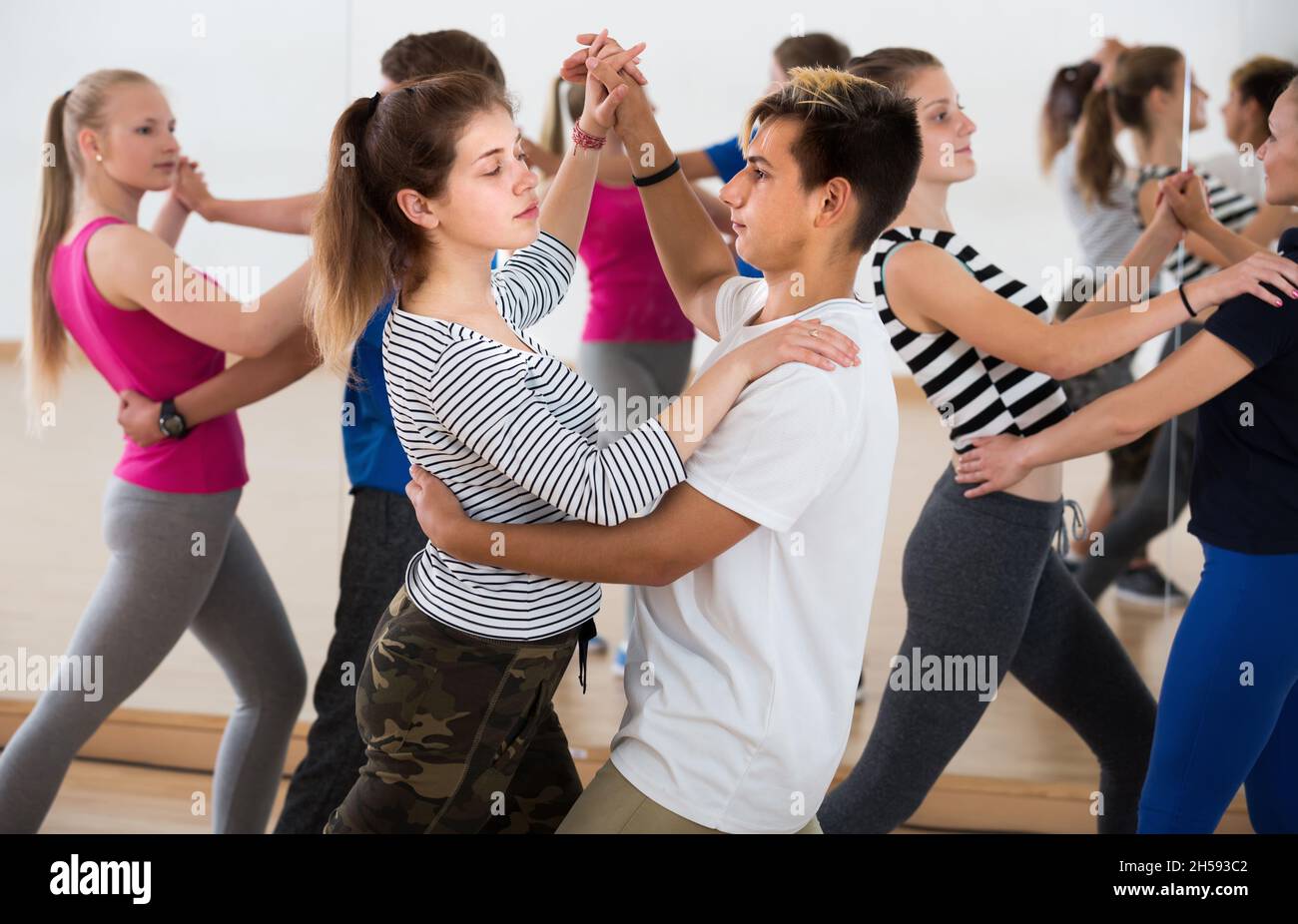 Portrait of smiling children dancing of partner dance Stock Photo - Alamy