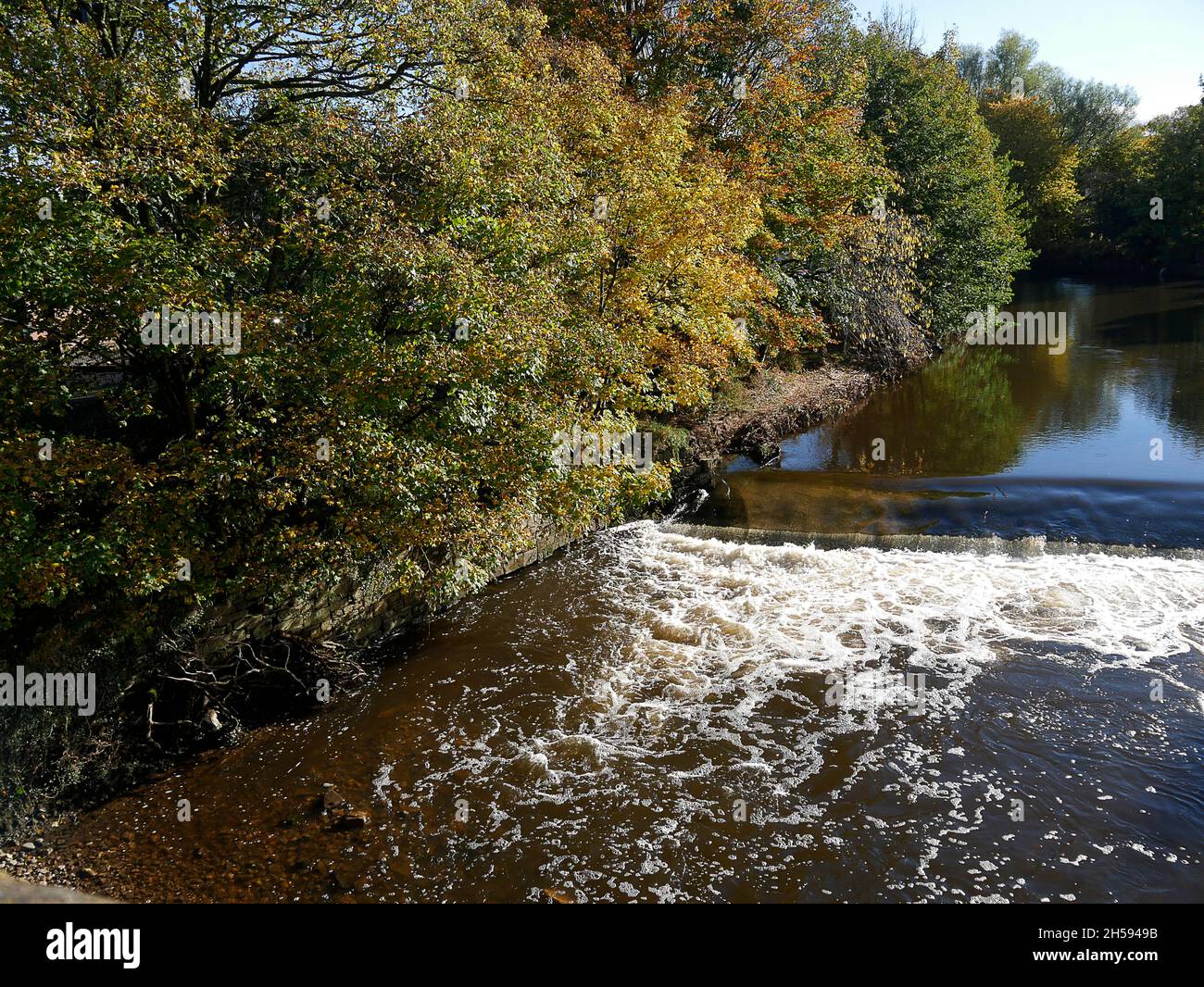 The River Calder from the bridge across it in Padiham Town Centre ...