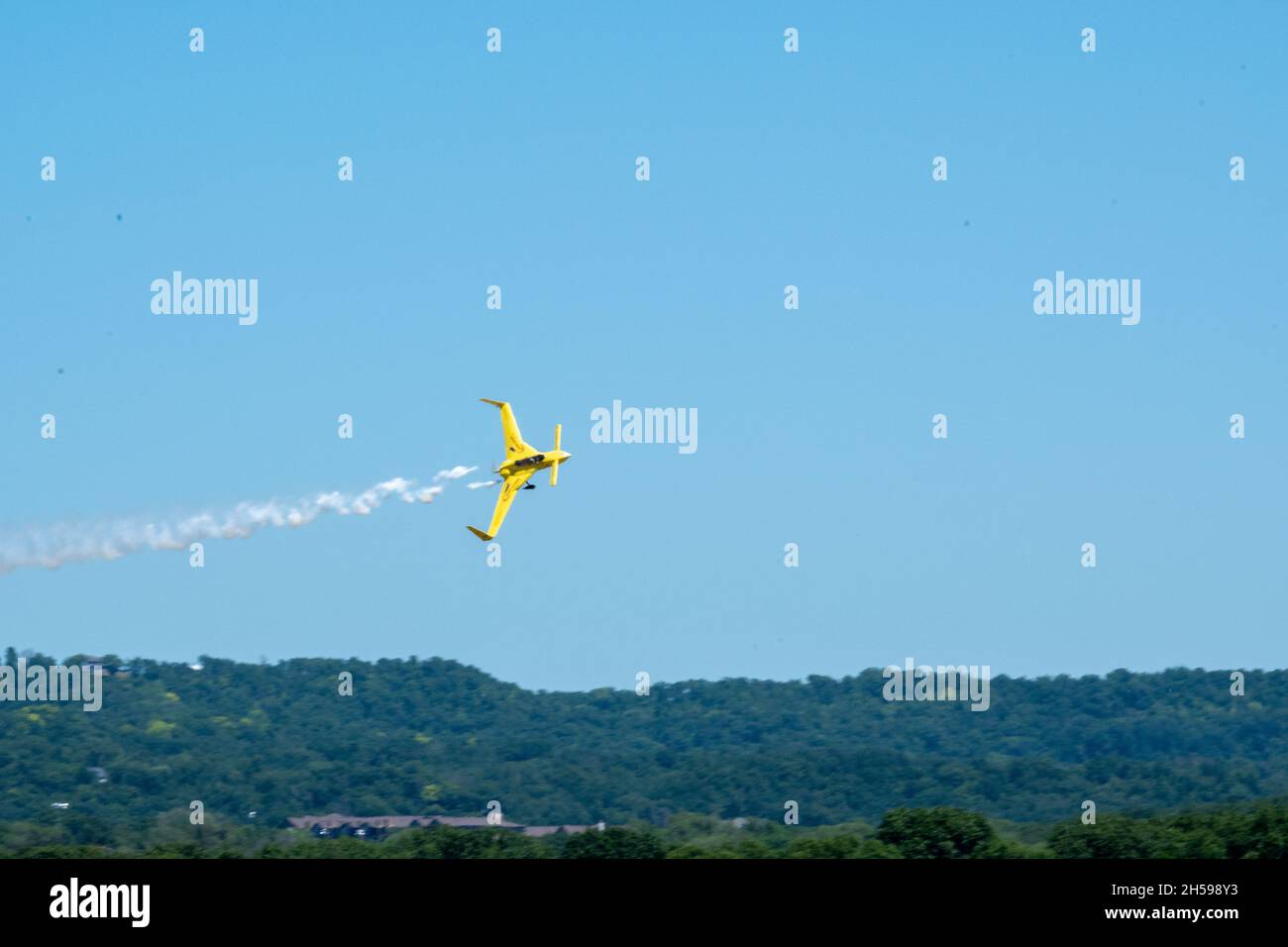 Flying aircraft against a blue sky during an airshow Stock Photo - Alamy