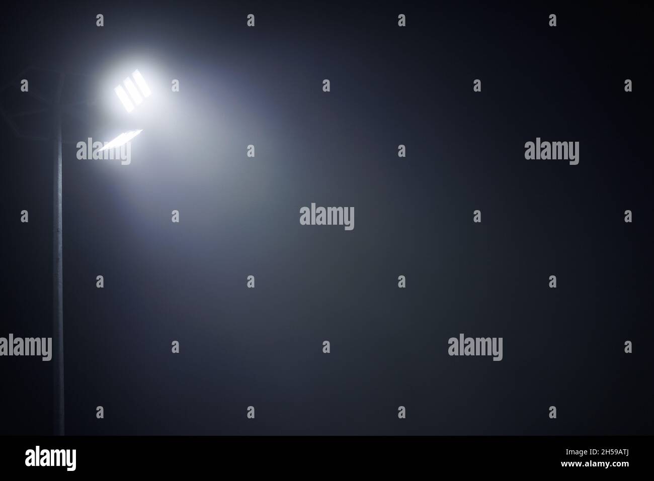lamp post with two led lamps at foggy night Stock Photo - Alamy