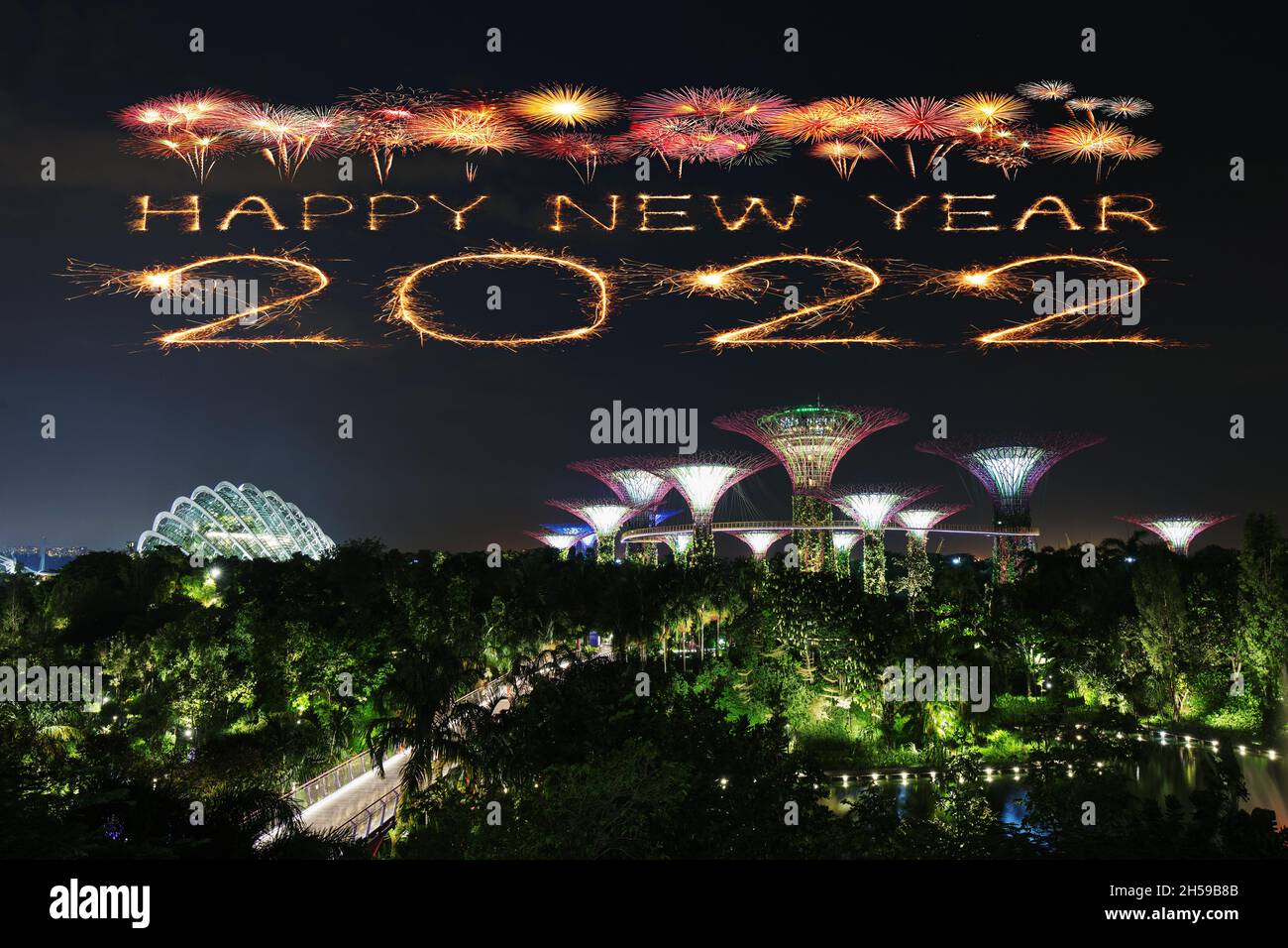 2022 Happy New Year fireworks celebrating over Singapore cityscape at ...