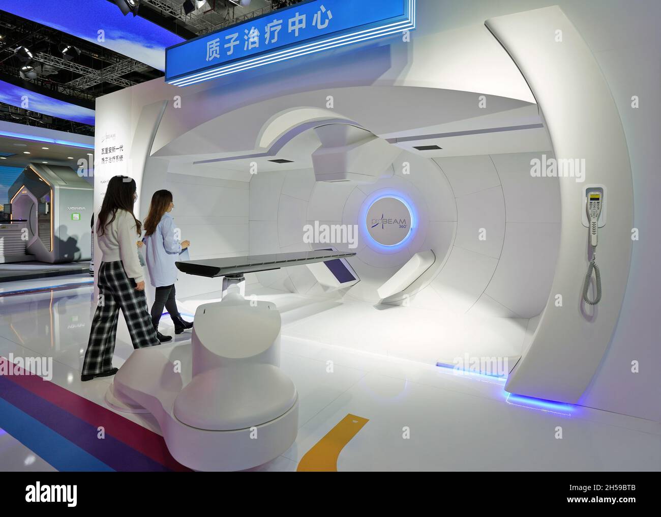SHANGHAI, CHINA - NOVEMBER 7, 2021 - Visitors visit a proton therapy ...
