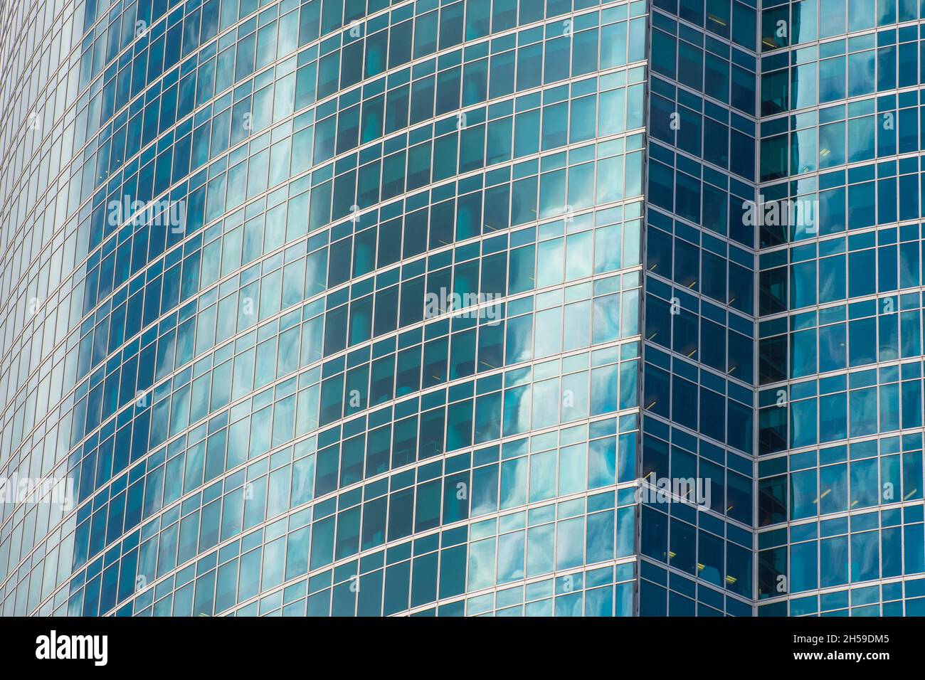 Abstract architecture of a modern building turquoise colored glass ...