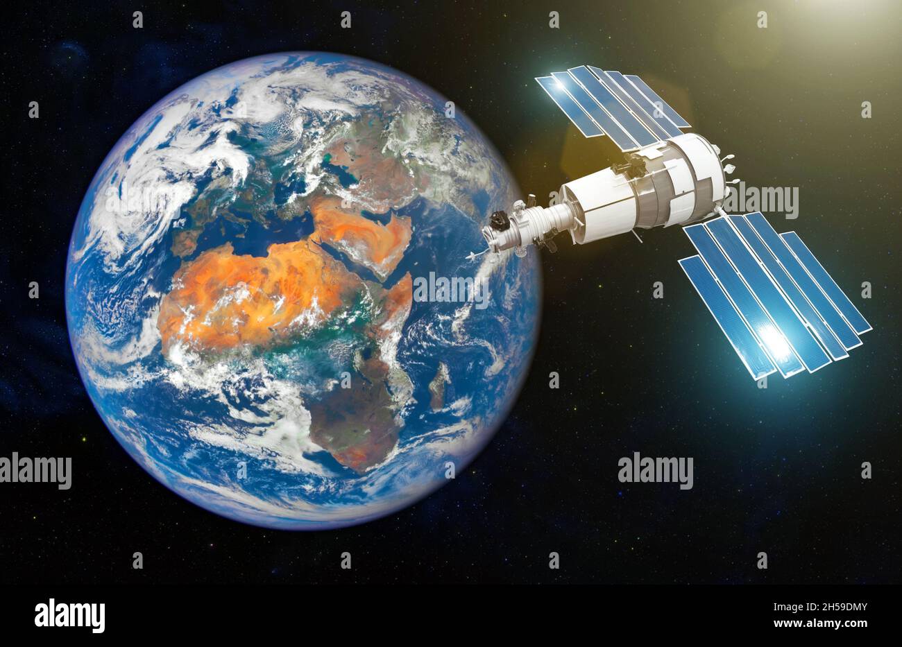Research satellite with open solar panels in the geostationary orbit of ...