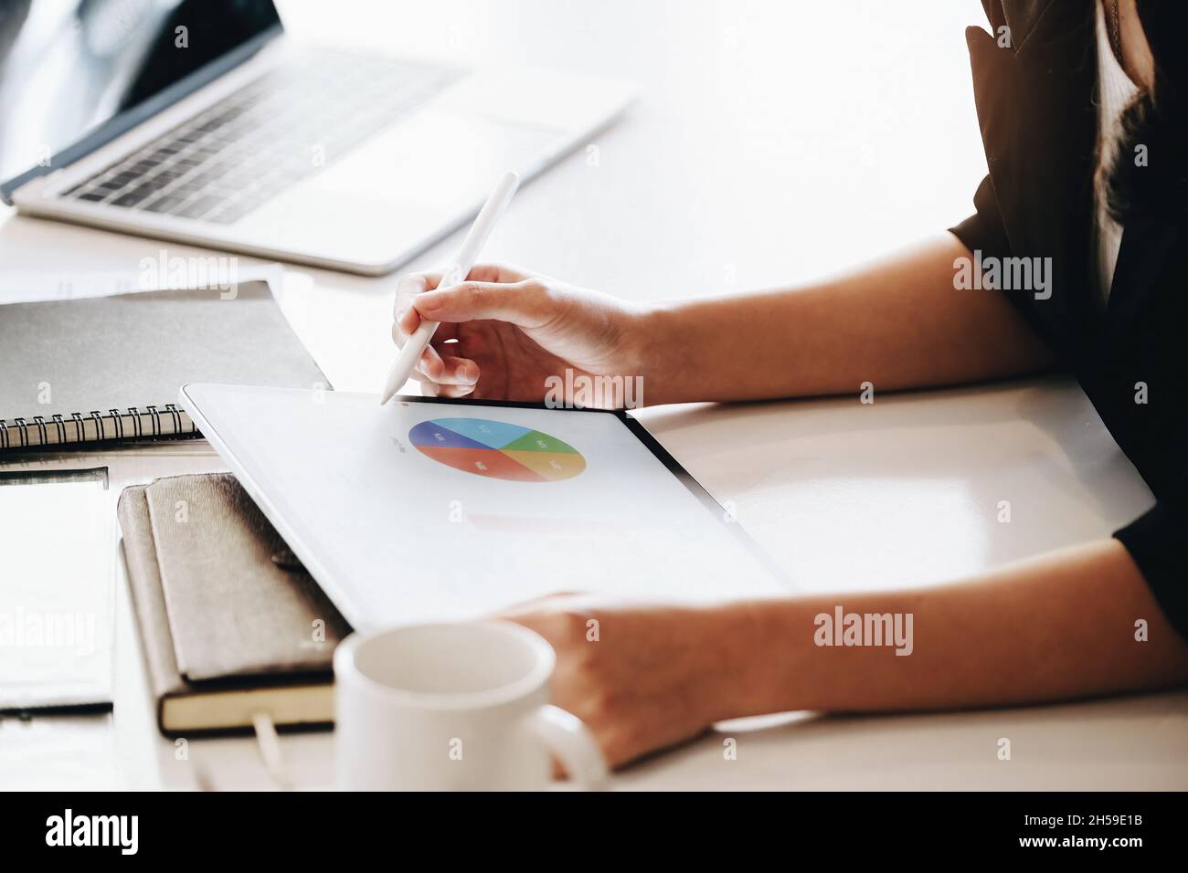 Business owners are using a computer tablet. in managing financial ...