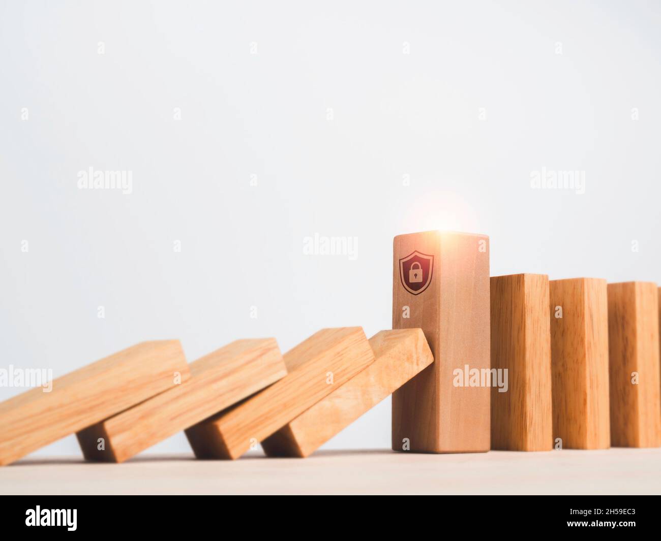 The big wooden block strong with shield security icon symbol standing ...