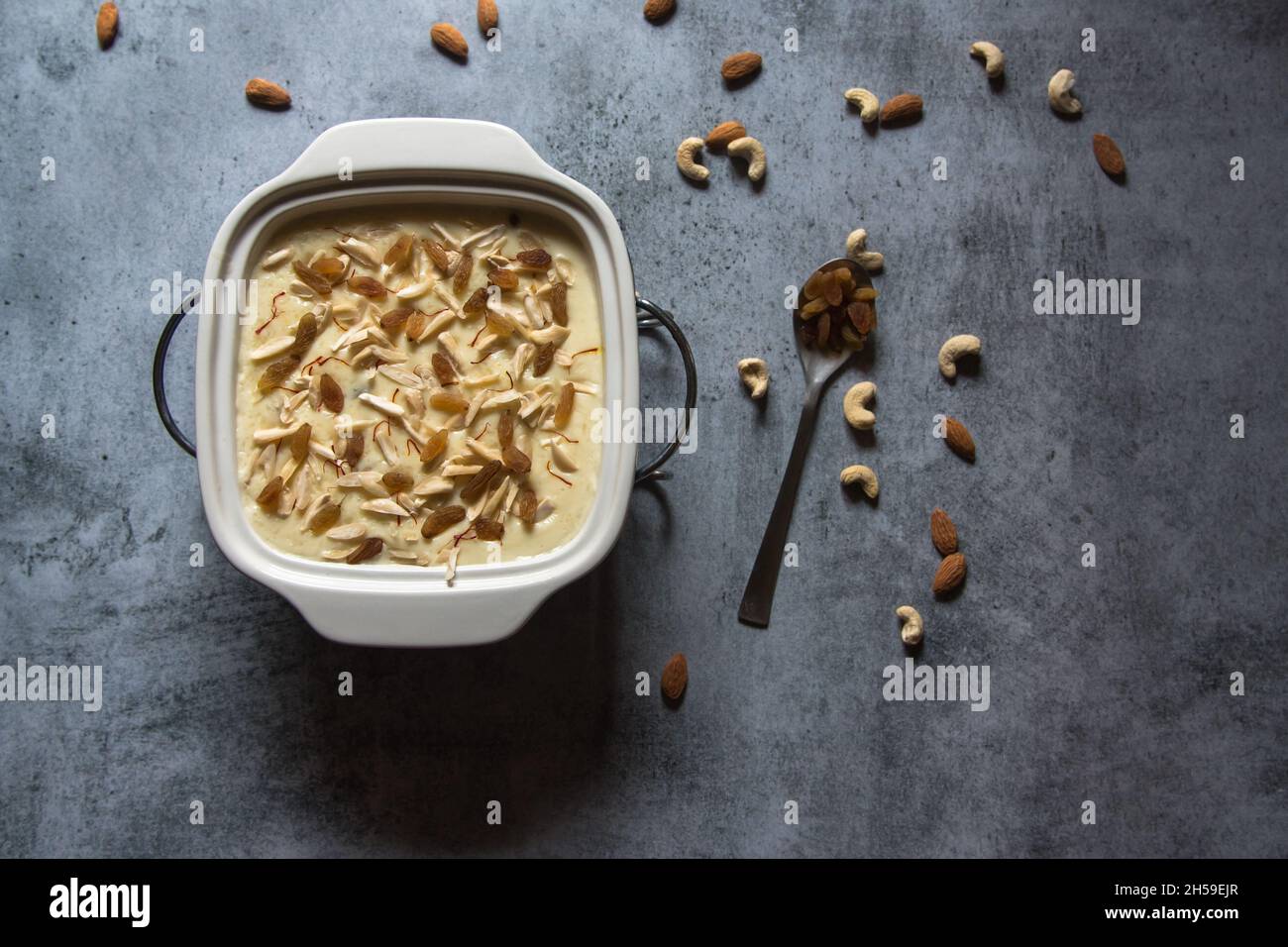 Popular Indian dessert kheer or rice pudding prepared by boiling rice ...