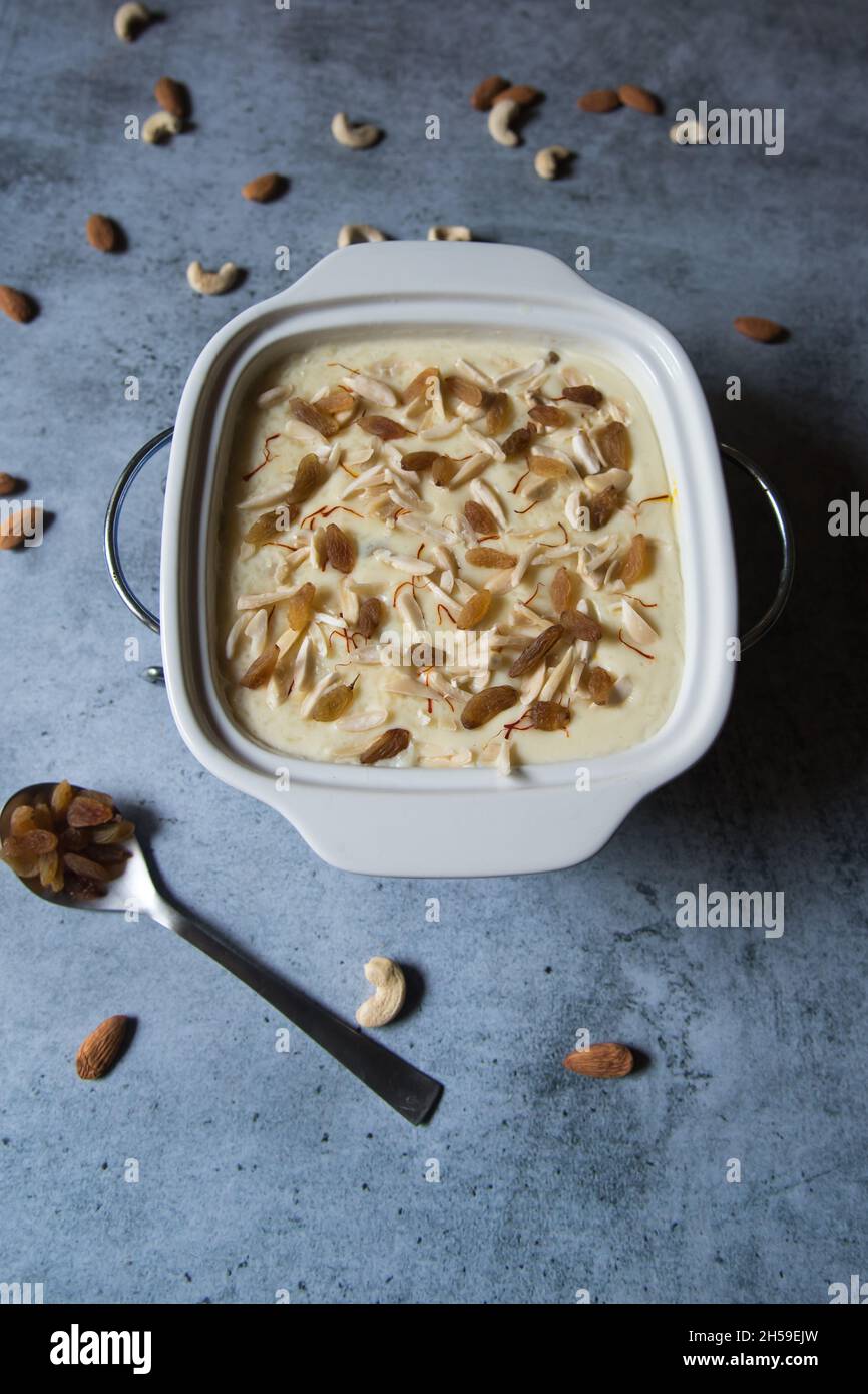 Popular Indian dessert kheer or rice pudding prepared by boiling rice ...