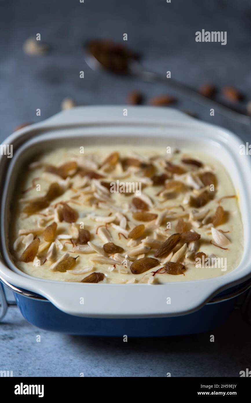 Popular Indian dessert kheer or rice pudding prepared by boiling rice ...